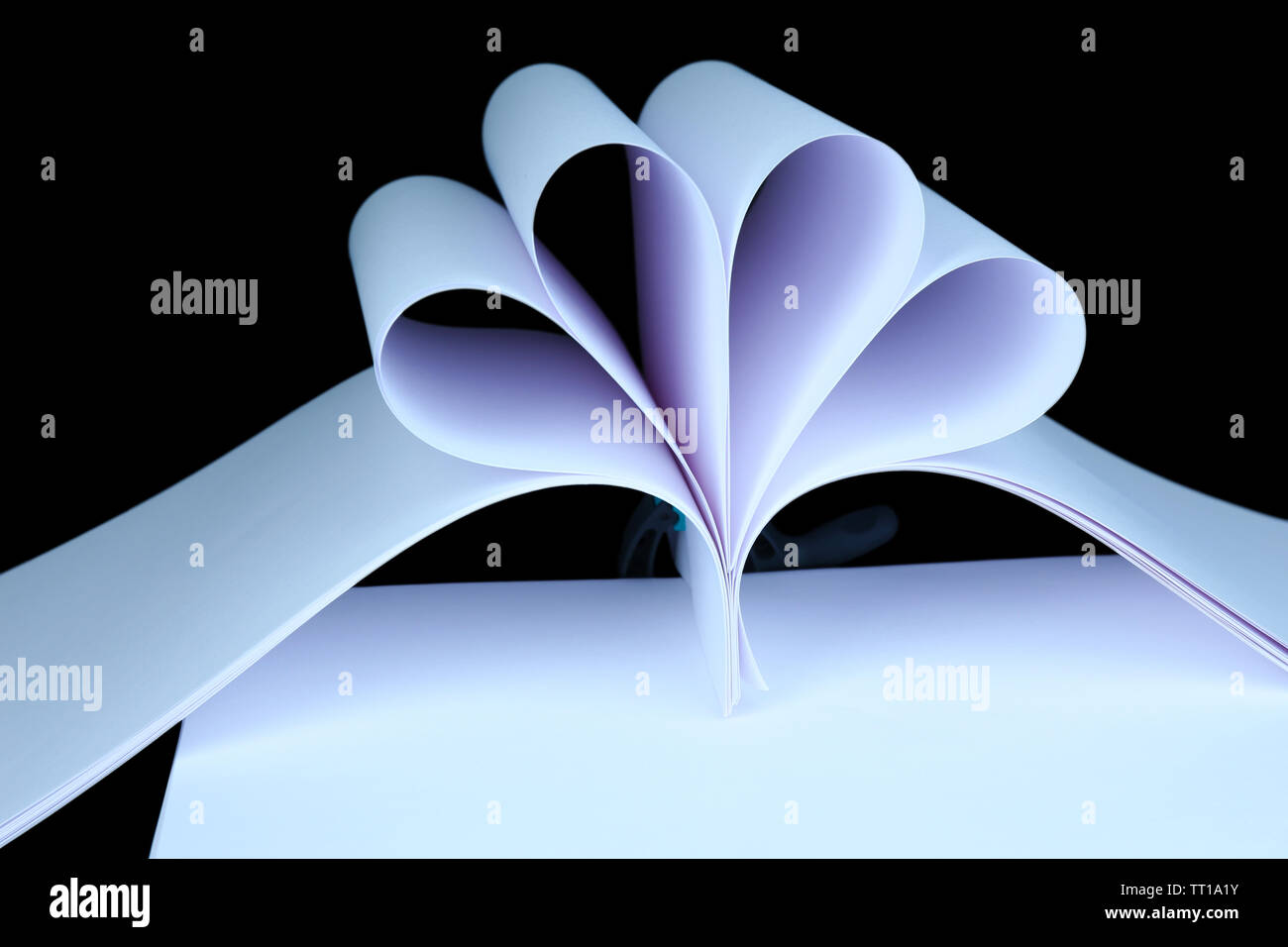 Abstract image of sheets white paper wave shape on black background ...