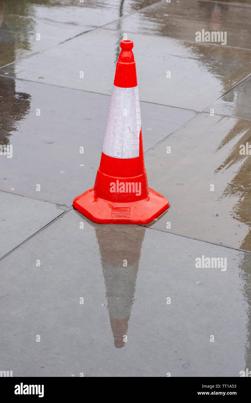 Orange and white small plastic traffic bollards or cones Stock Photo ...