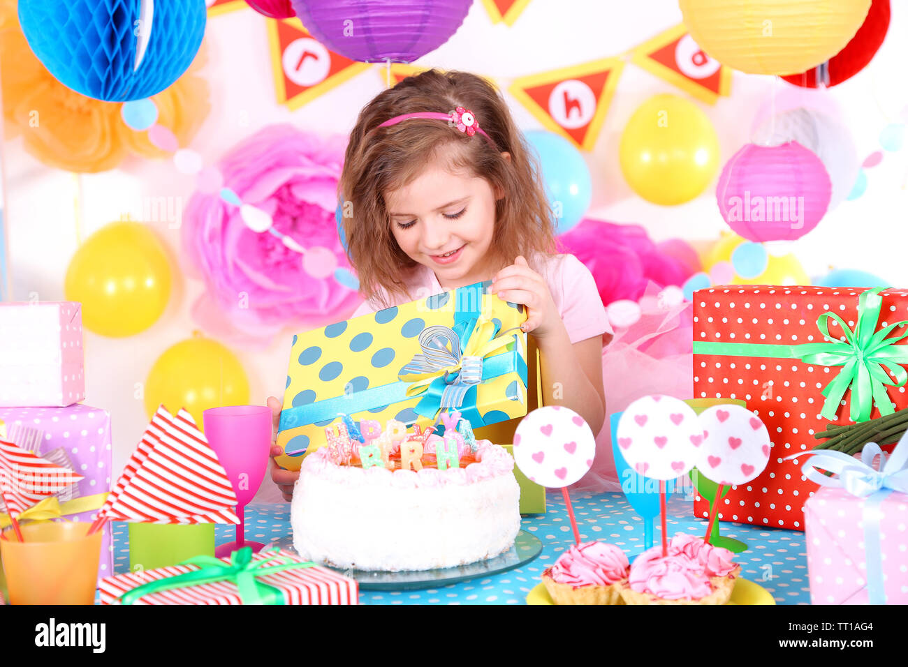 Pretty little girl celebrate her birthday Stock Photo - Alamy