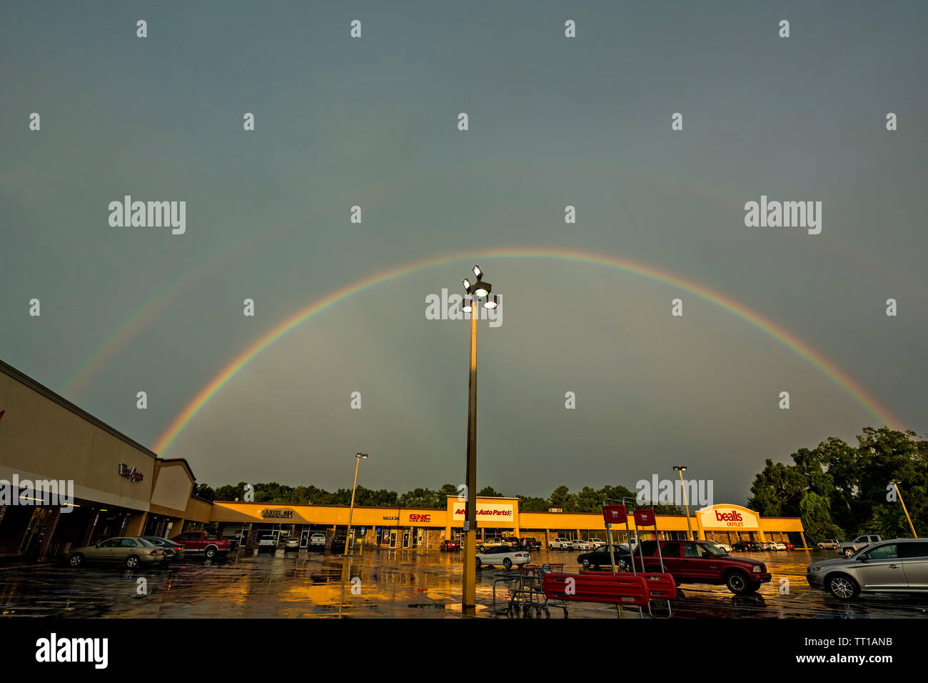 Beautiful late afternoon rainbow appears over a North Florida shopping ...