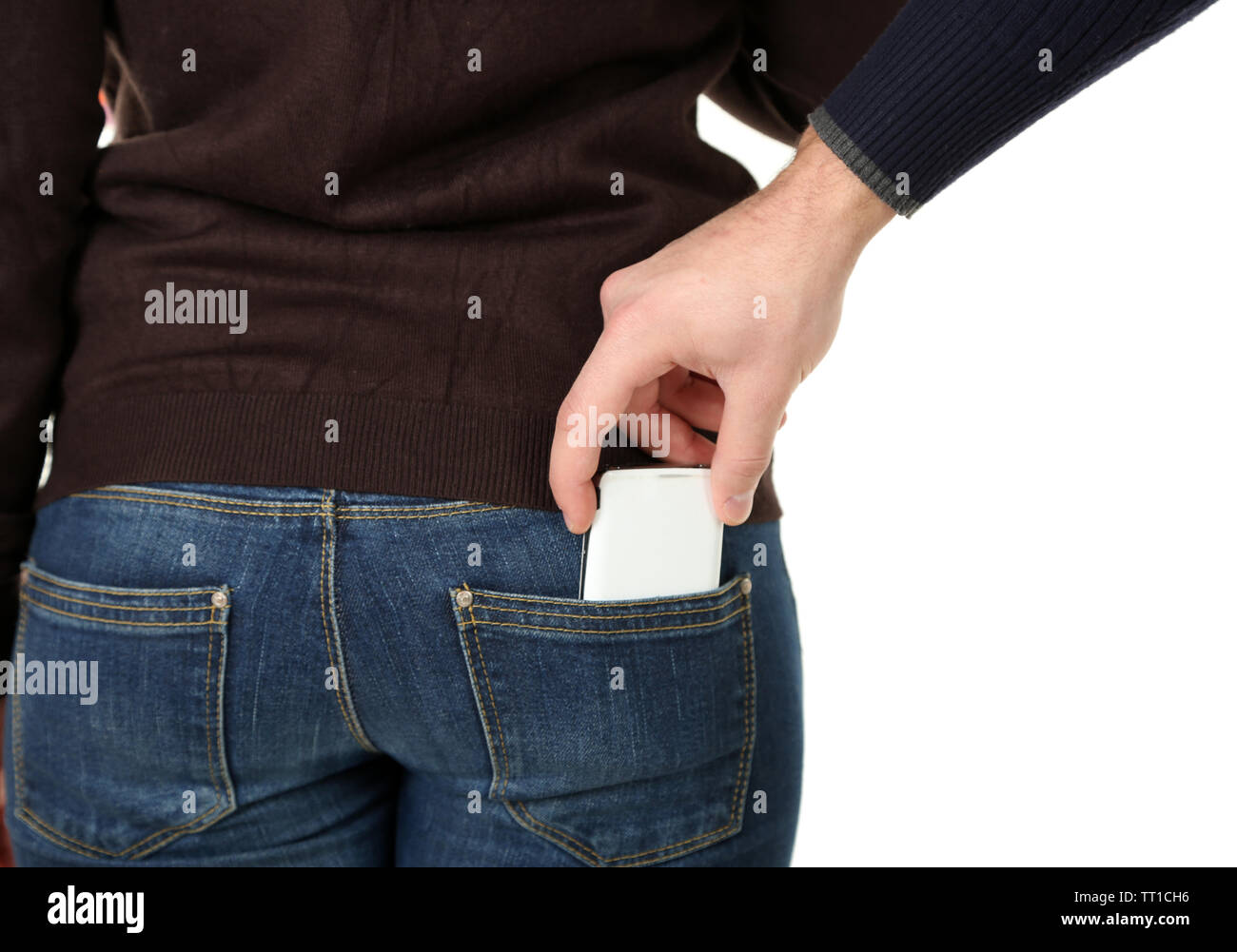 Pickpocket are stealing mobile phone from back pocket, close up ...