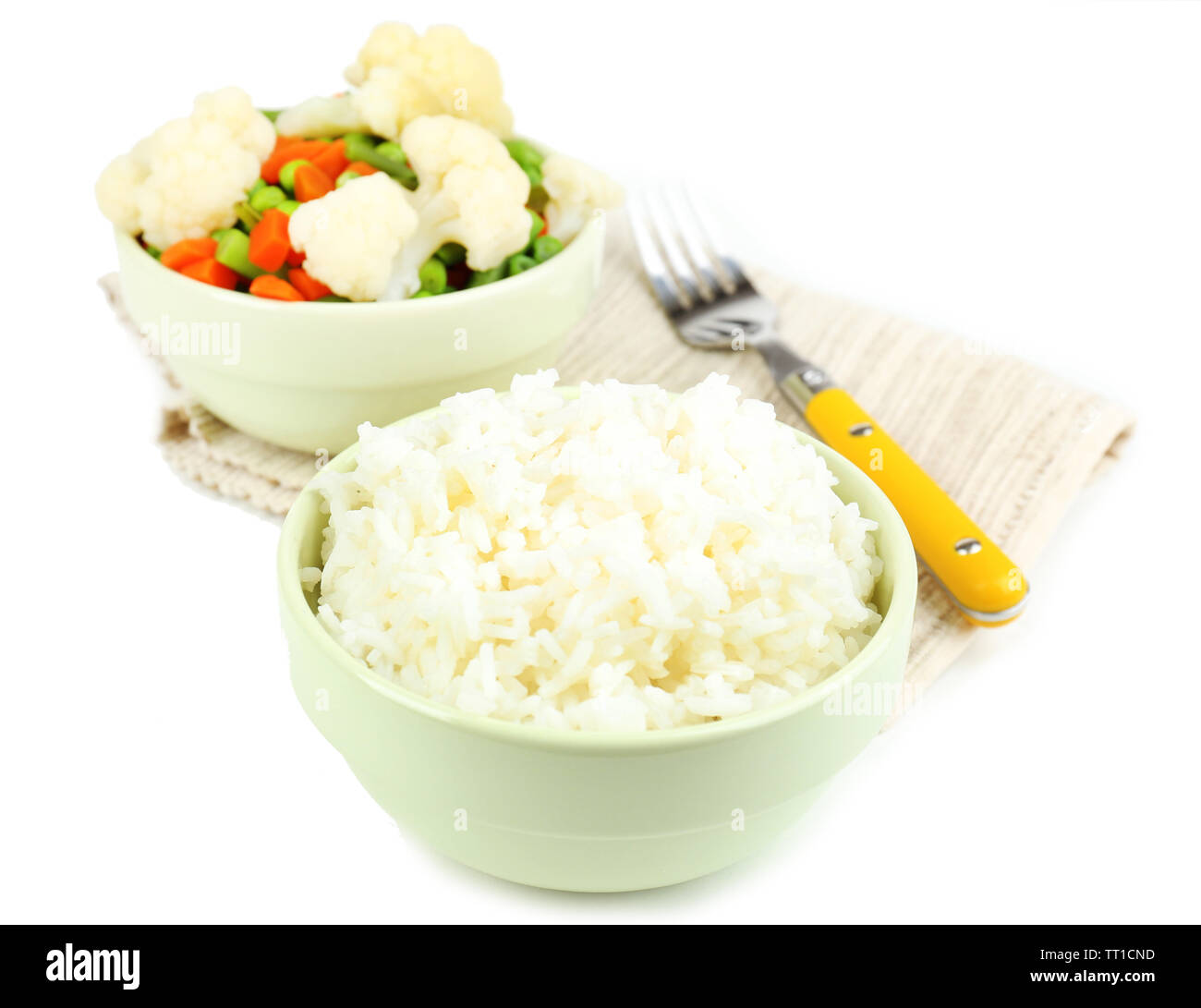 Cooked rice and vegetables isolated on white Stock Photo - Alamy