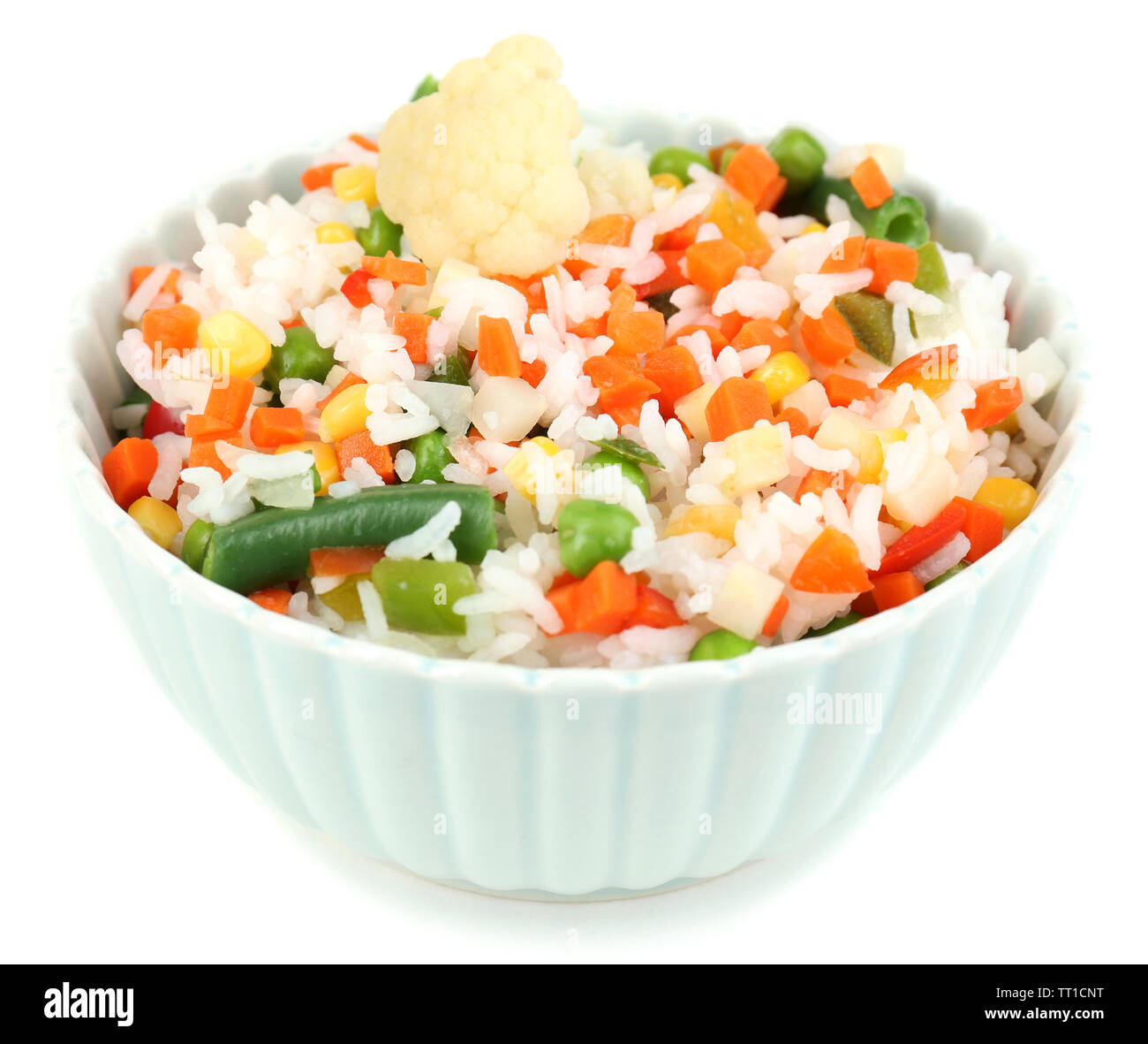 Cooked rice with vegetables isolated on white Stock Photo - Alamy