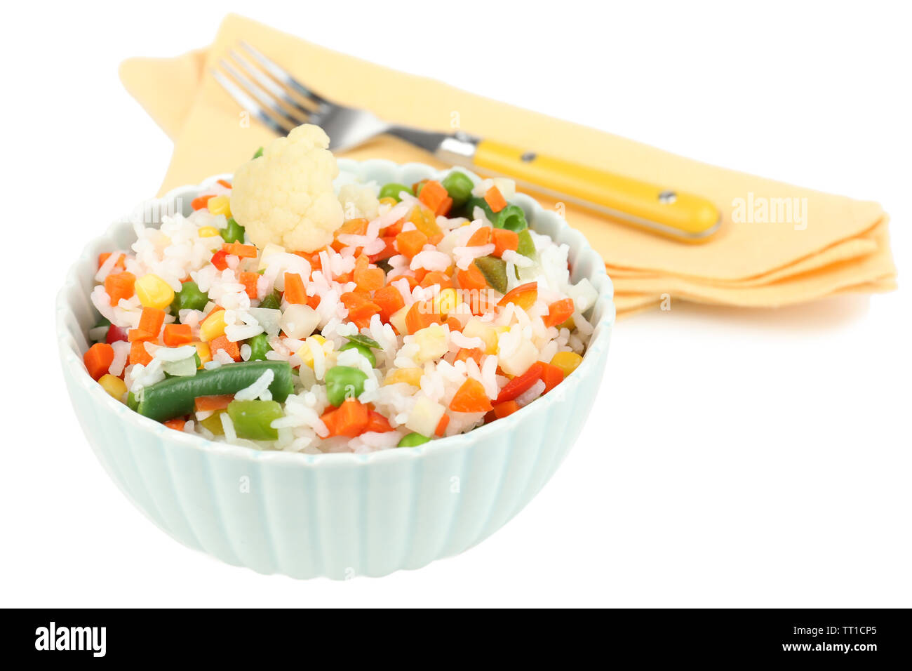 Cooked rice with vegetables isolated on white Stock Photo - Alamy
