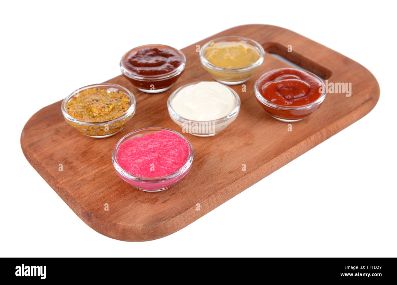 Various sauces on chopping board isolated on white Stock Photo - Alamy