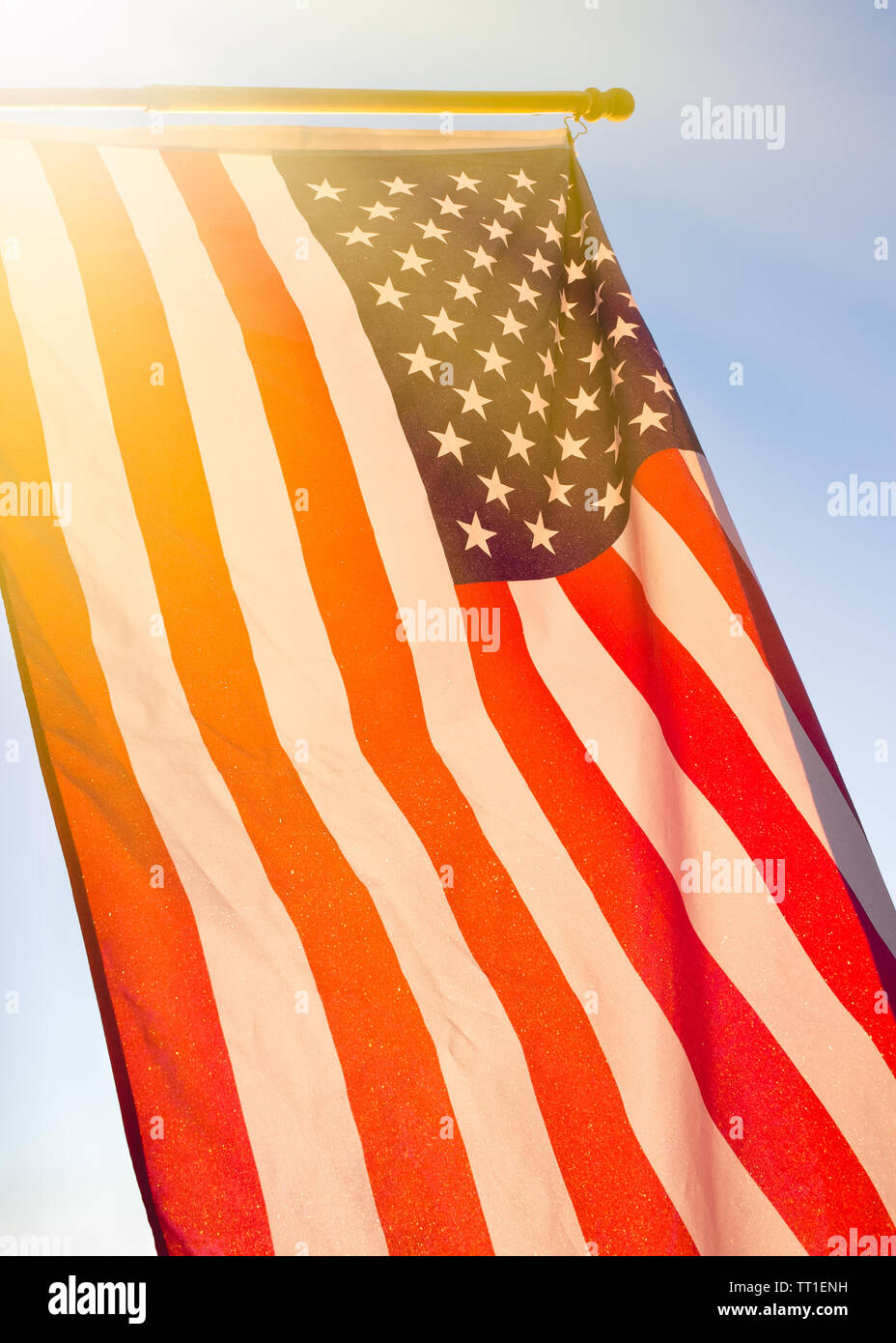 American flag with sun flare Stock Photo - Alamy