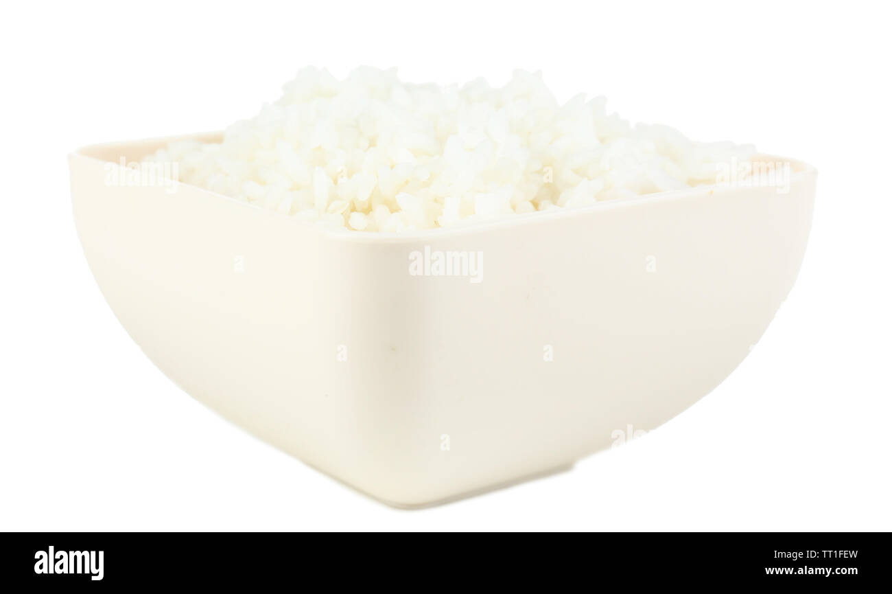 Cooked rice in bowl isolated on white Stock Photo - Alamy