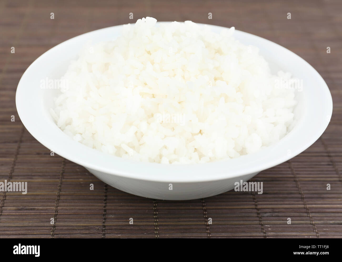 Cooked rice on bamboo background Stock Photo - Alamy