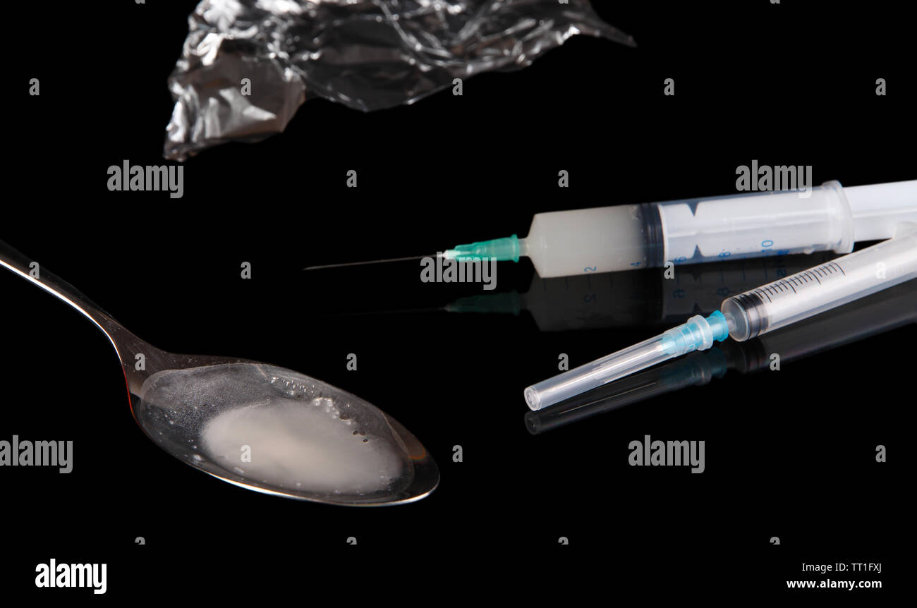 Cooking drugs in spoon lighter hi-res stock photography and images - Alamy