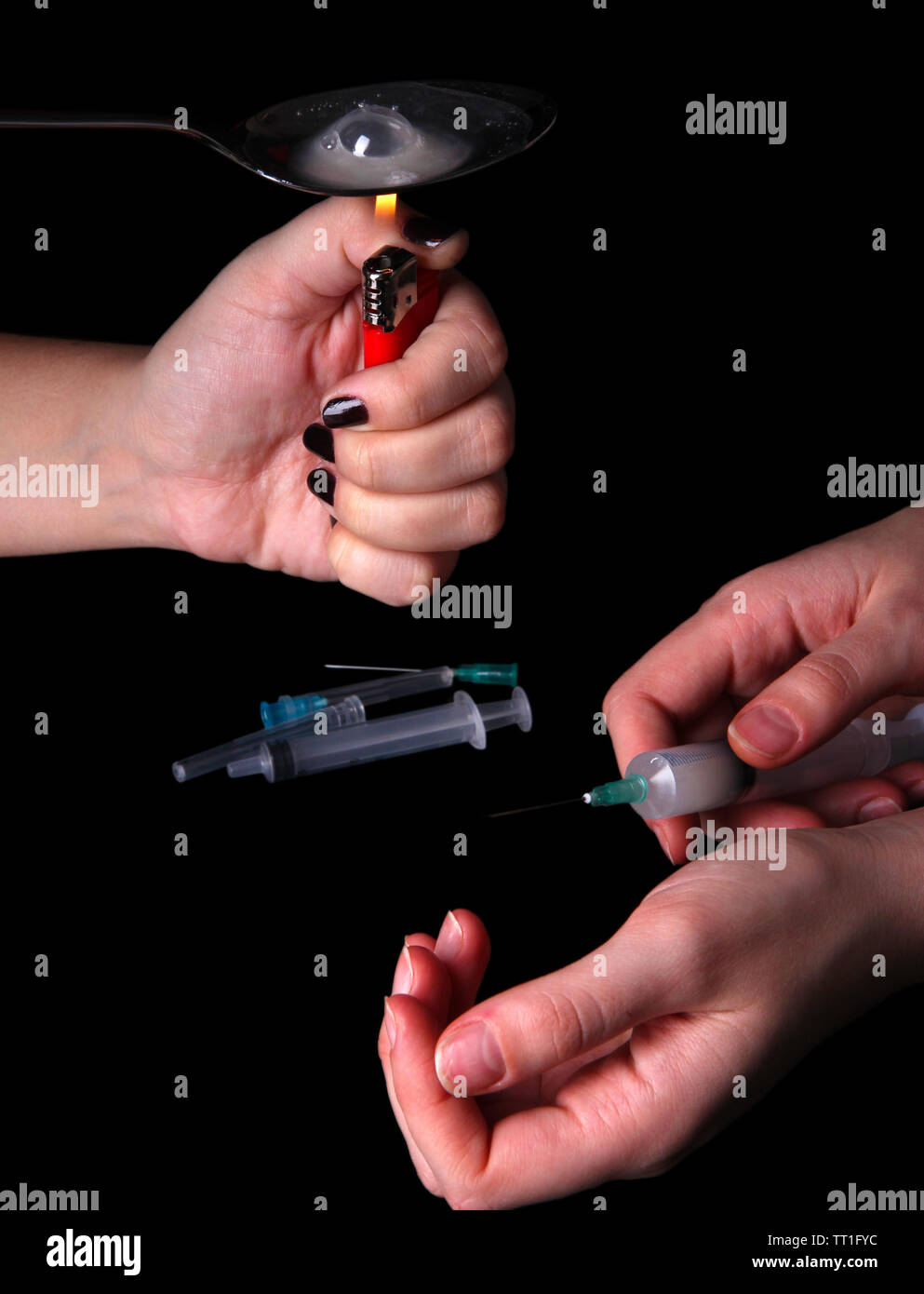 Drug addicts with syringe on black background Stock Photo - Alamy