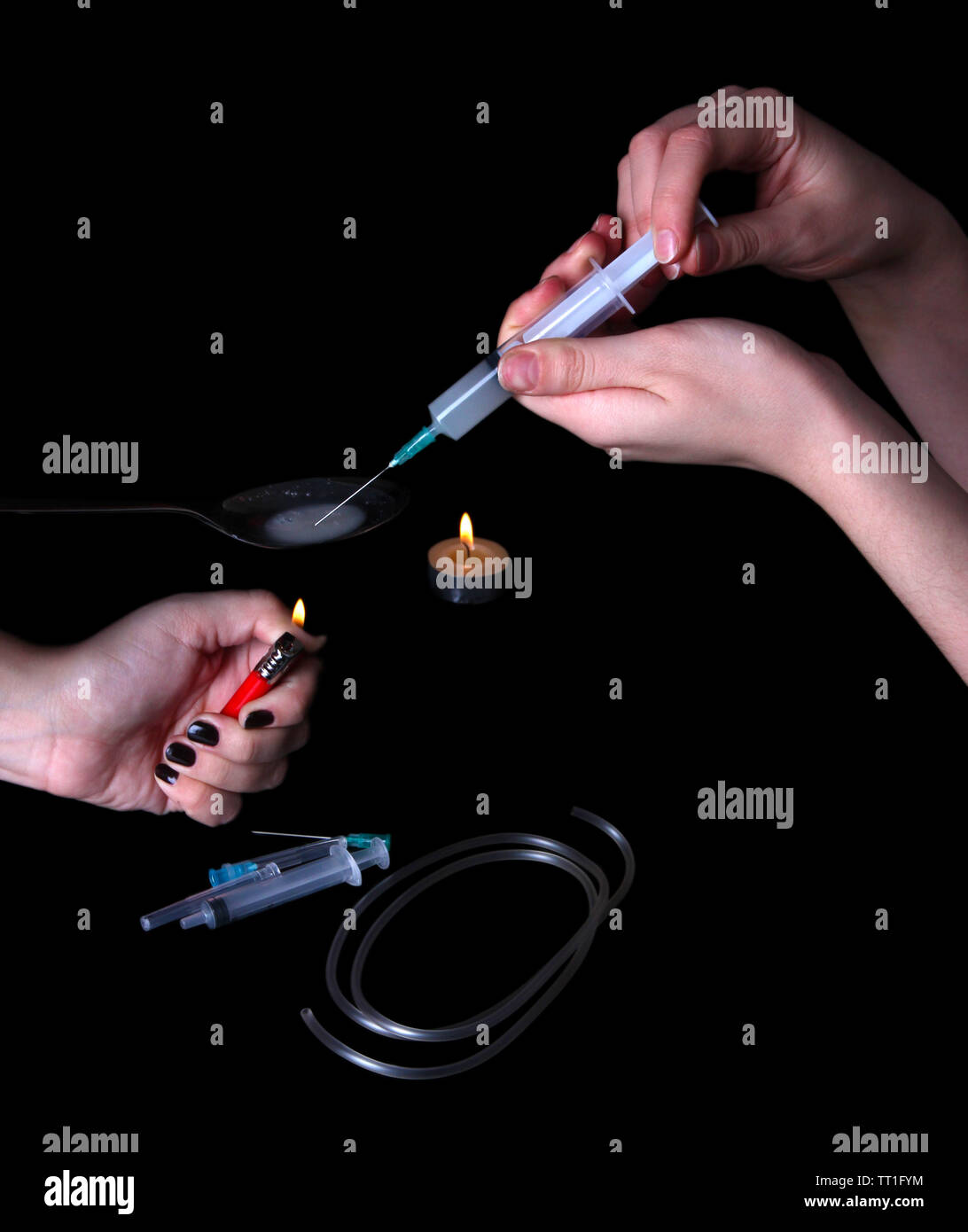 Drug addicts with syringe on black background Stock Photo - Alamy