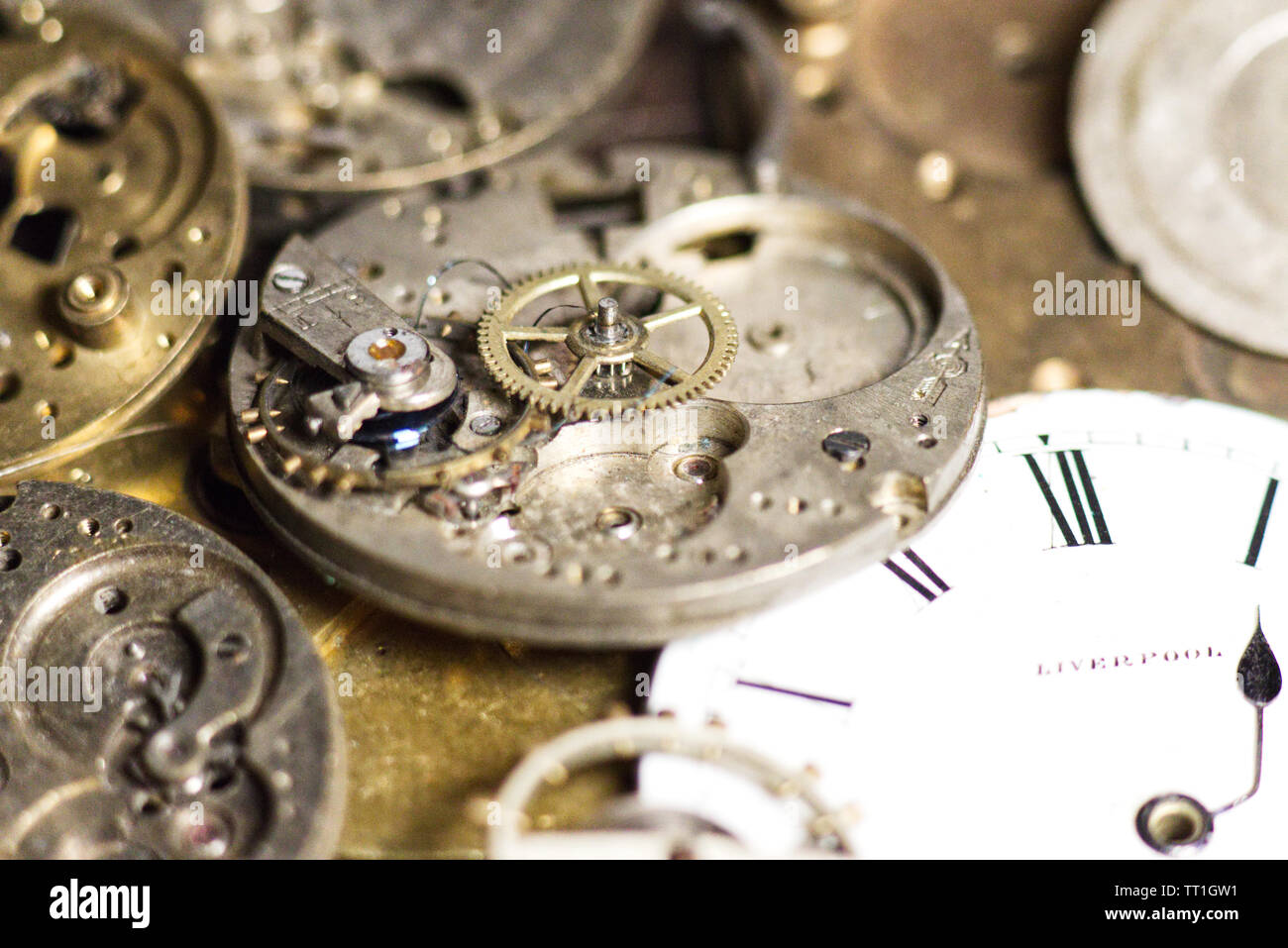Antique watch parts, cogs, mechanisms, springs and faces Stock Photo ...