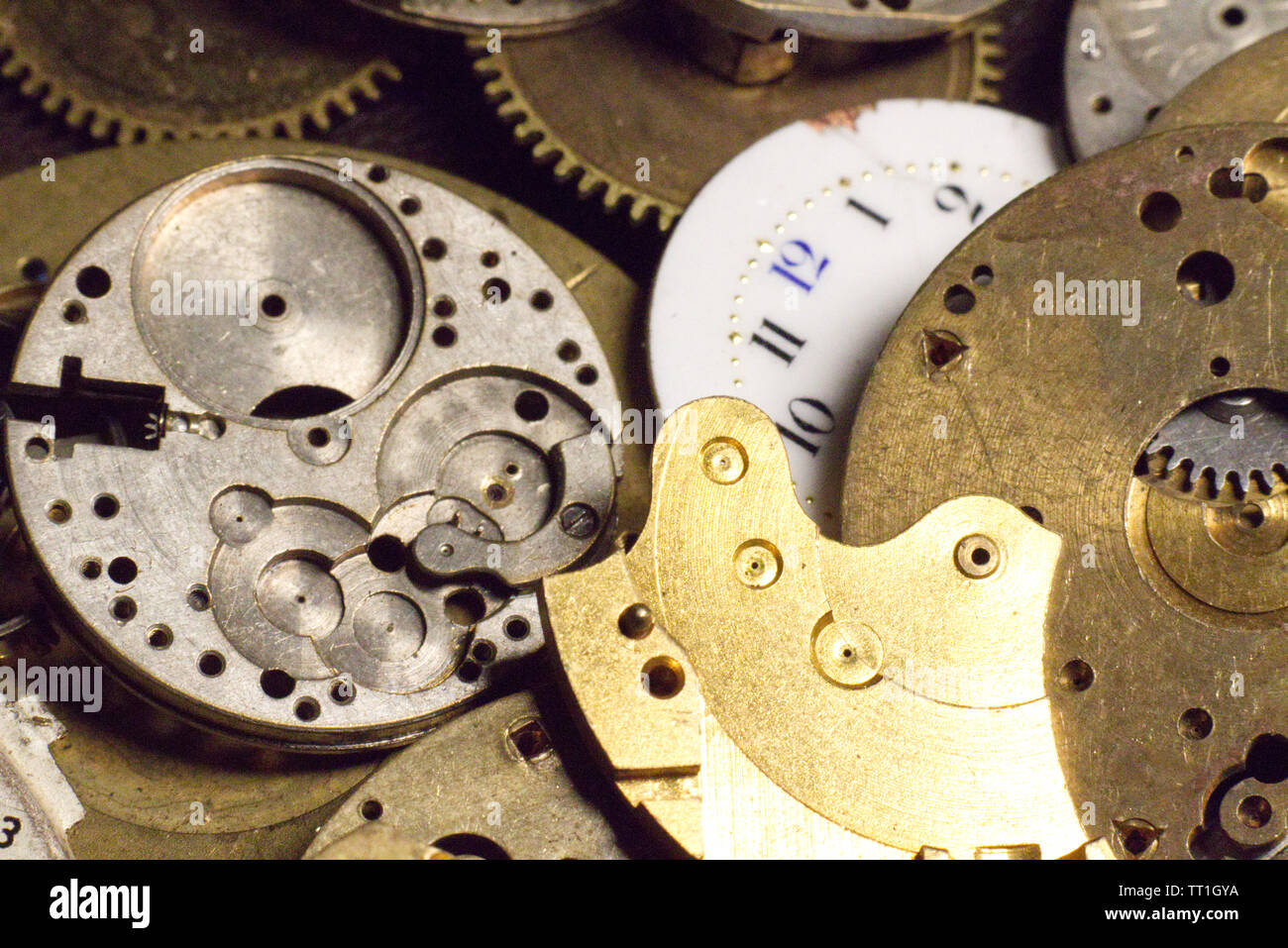 Antique watch parts, cogs, mechanisms, springs and faces Stock Photo ...