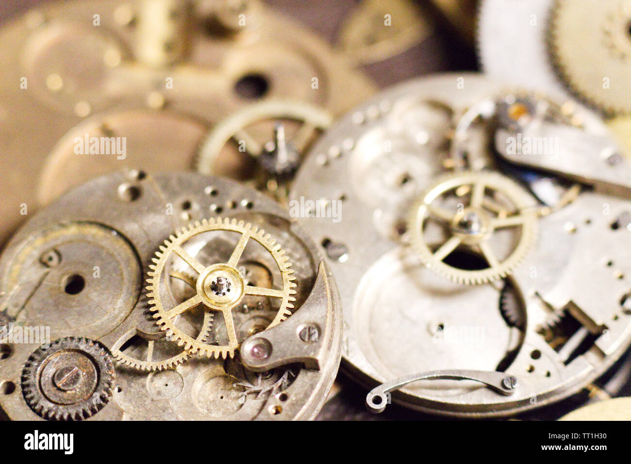 Antique watch parts, cogs, mechanisms, springs and faces Stock Photo ...