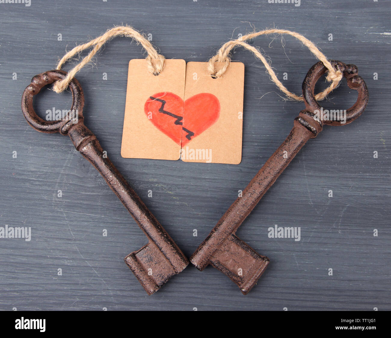 Keys to heart, Conceptual photo. On color wooden background Stock Photo ...