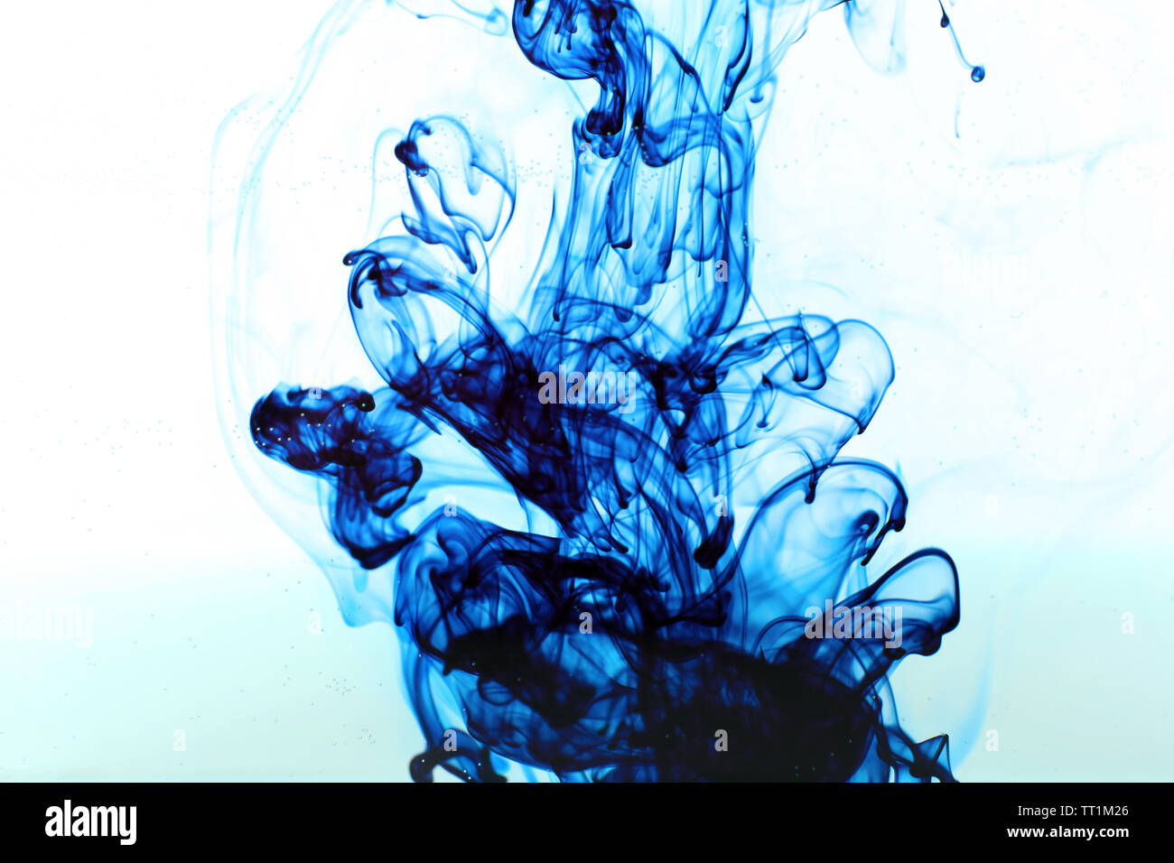 Ink in water isolated on white Stock Photo - Alamy