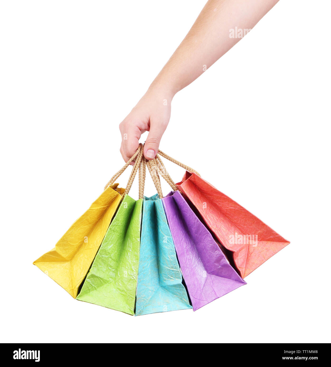 Colorful shopping bags in female hand, isolated on white Stock Photo ...