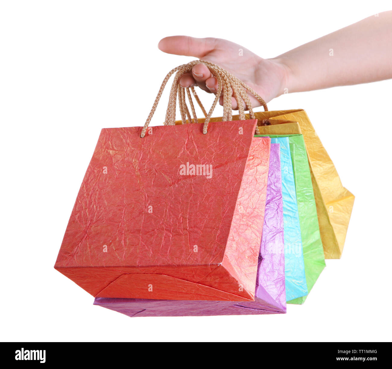 Colorful shopping bags in female hand, isolated on white Stock Photo ...