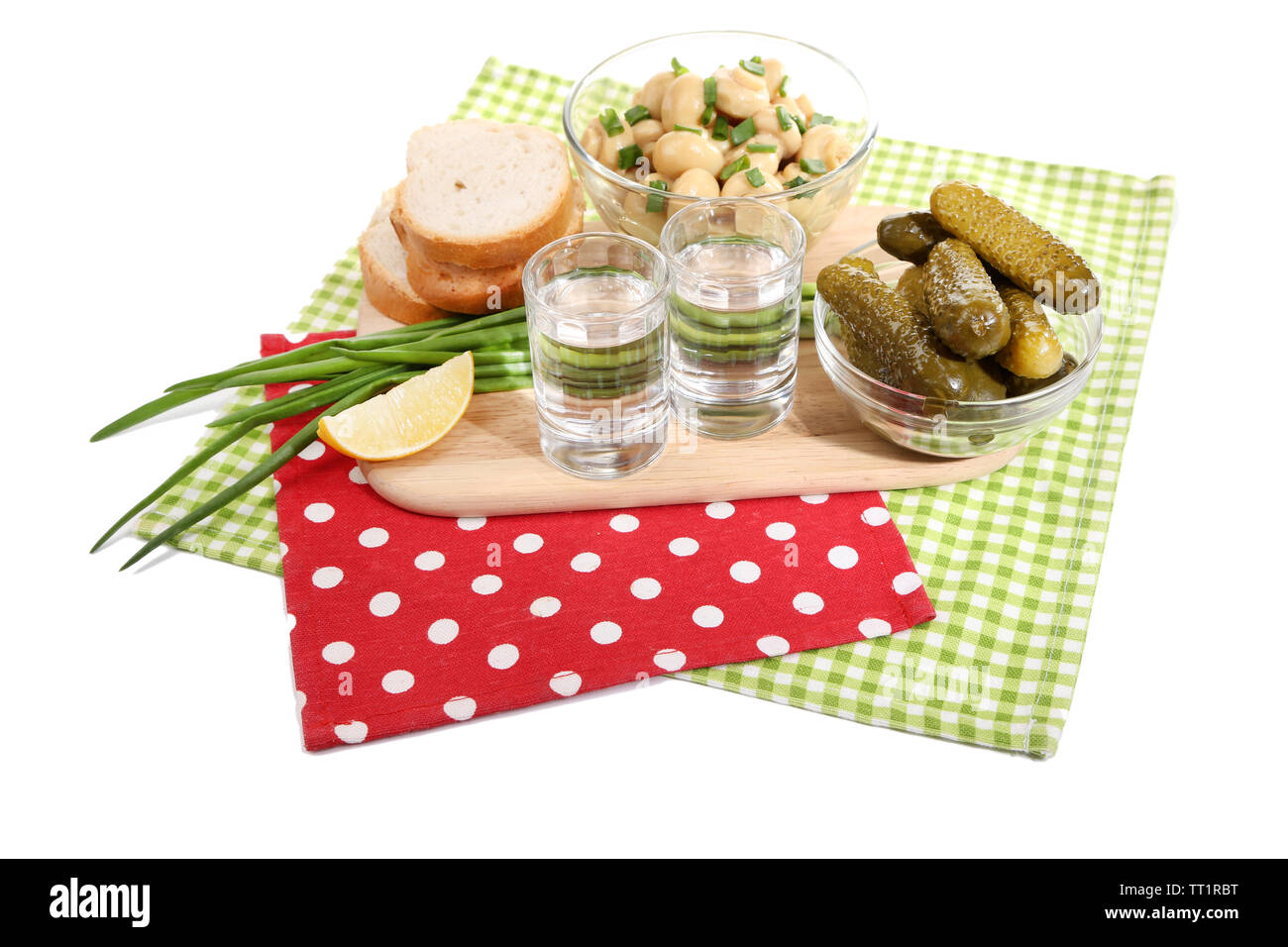 Composition with glass of vodka and marinated mushrooms, cucumbers on ...
