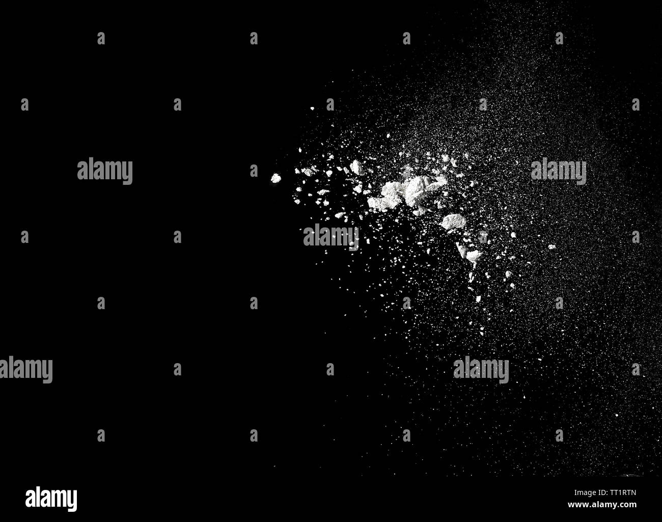Flour on black background Stock Photo - Alamy