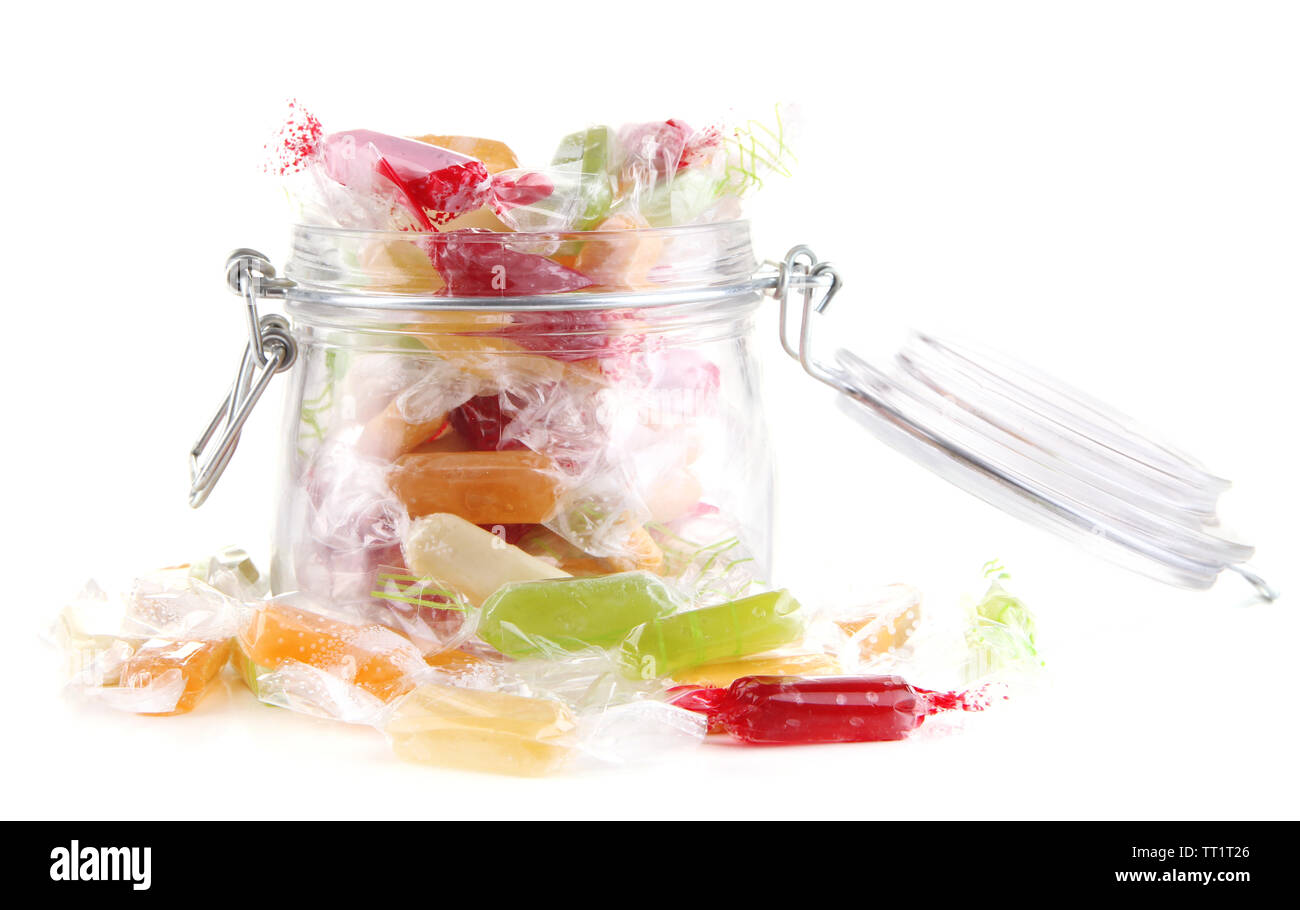 Tasty candies in jar isolated on white Stock Photo - Alamy
