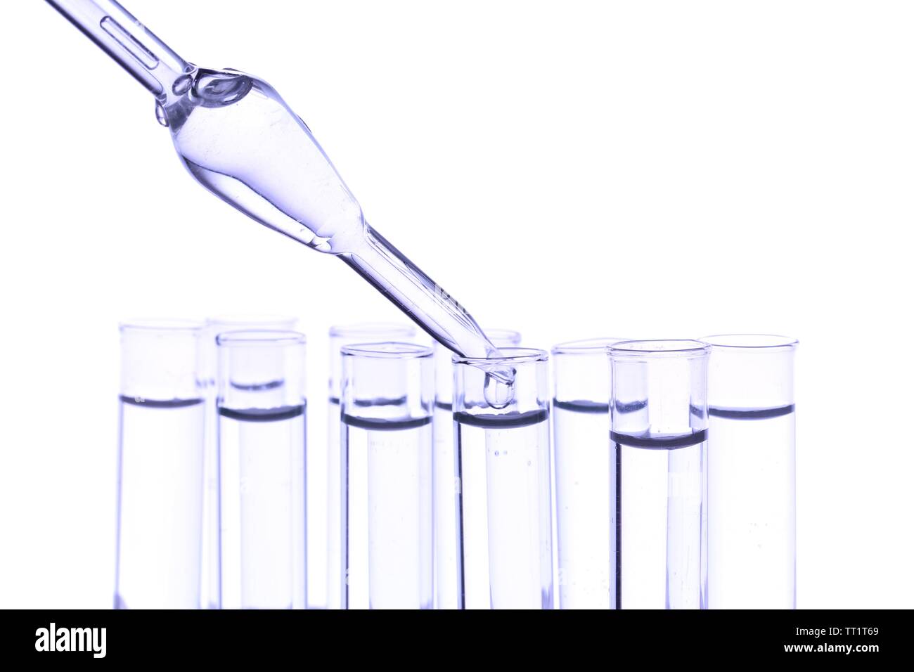 Dropper and test tubes, close up, isolated on white Stock Photo - Alamy