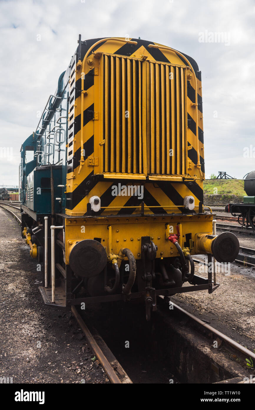 View of yellow and black front and grille of British Rail diesel train ...