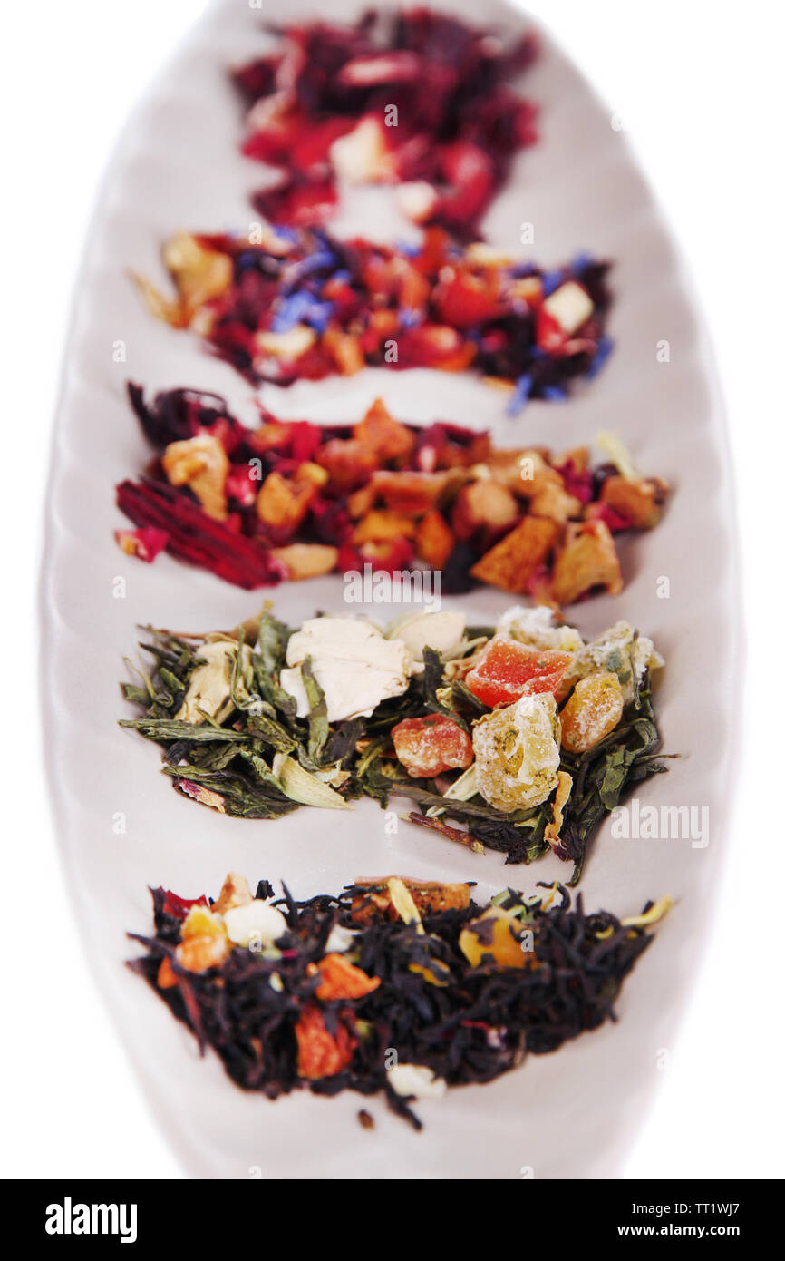 Different kinds of dry tea in dish close up Stock Photo - Alamy