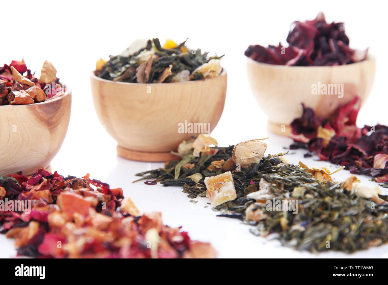 Different kinds of dry tea in bowls isolated on white Stock Photo - Alamy