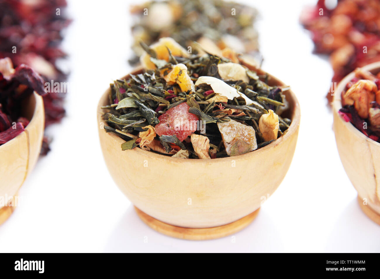 Different kinds of dry tea in bowls close up Stock Photo - Alamy