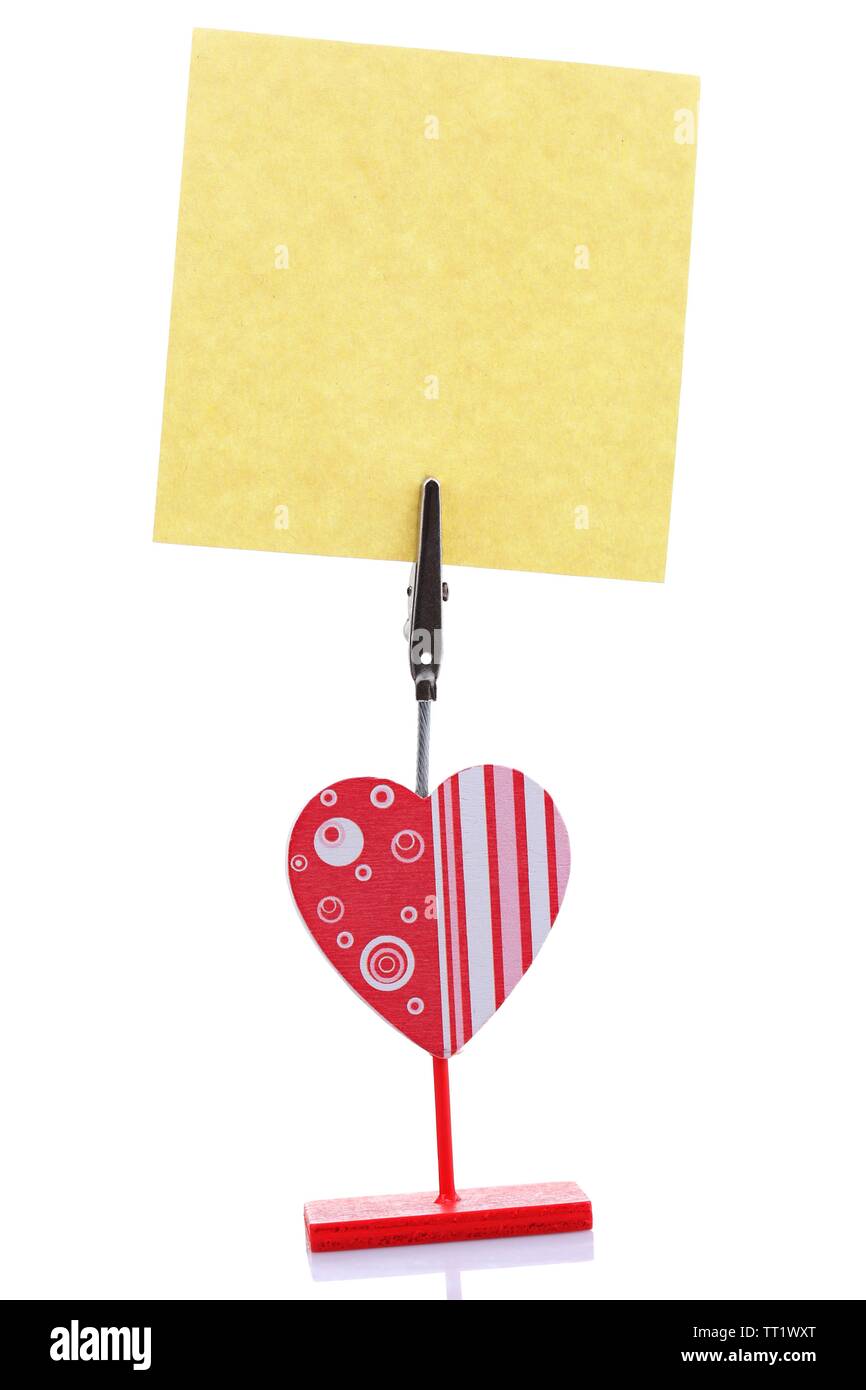 Empty note paper attached to message holder isolated on white Stock ...