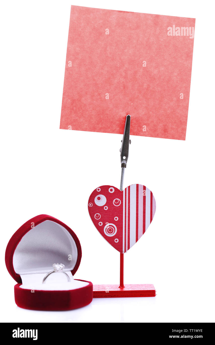 Empty note paper attached to message holder isolated on white Stock ...