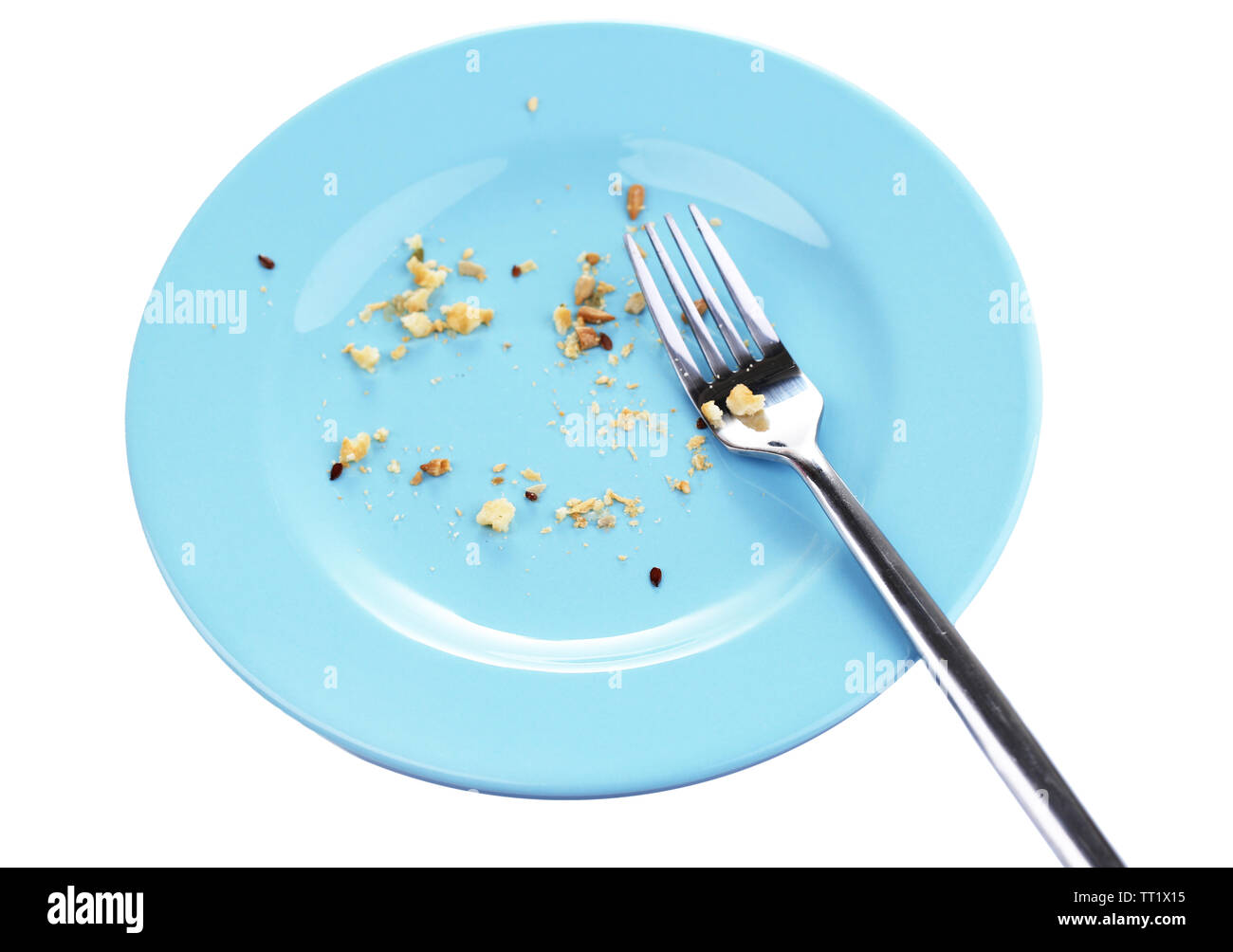 Plate with crumbs and used fork, close-up, on white background Stock ...