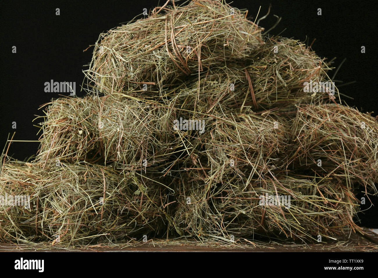 Hay, on dark background Stock Photo - Alamy