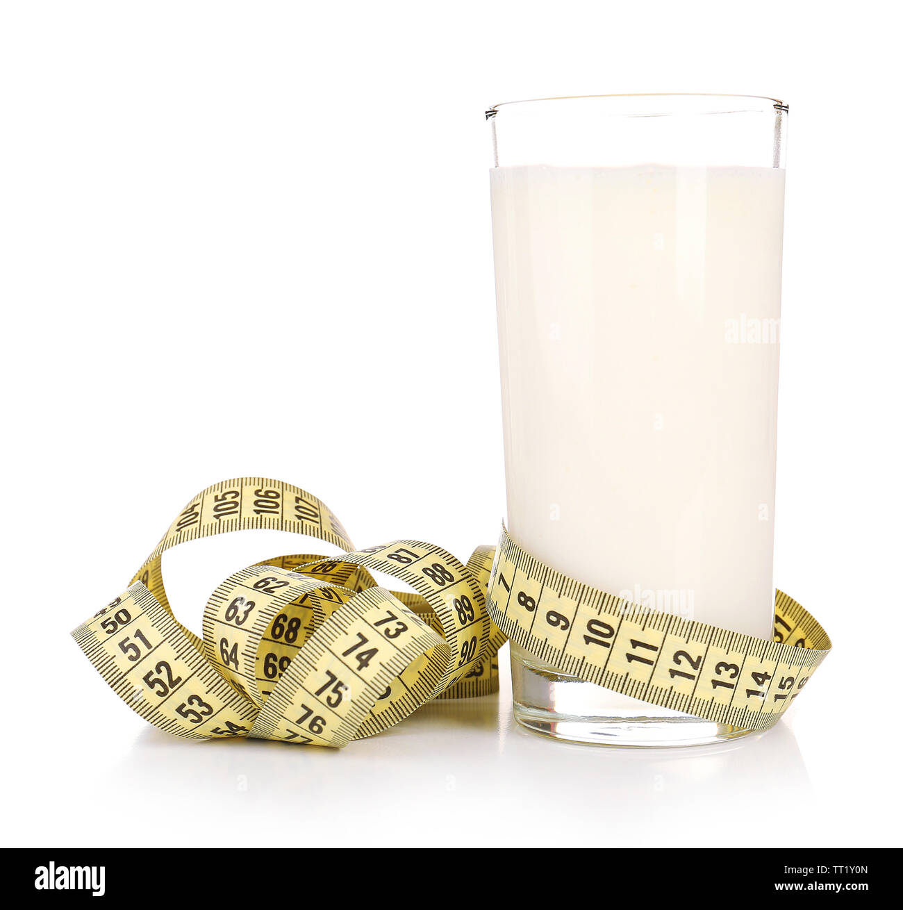 Glass of milk with measuring tape isolated on white Stock Photo - Alamy