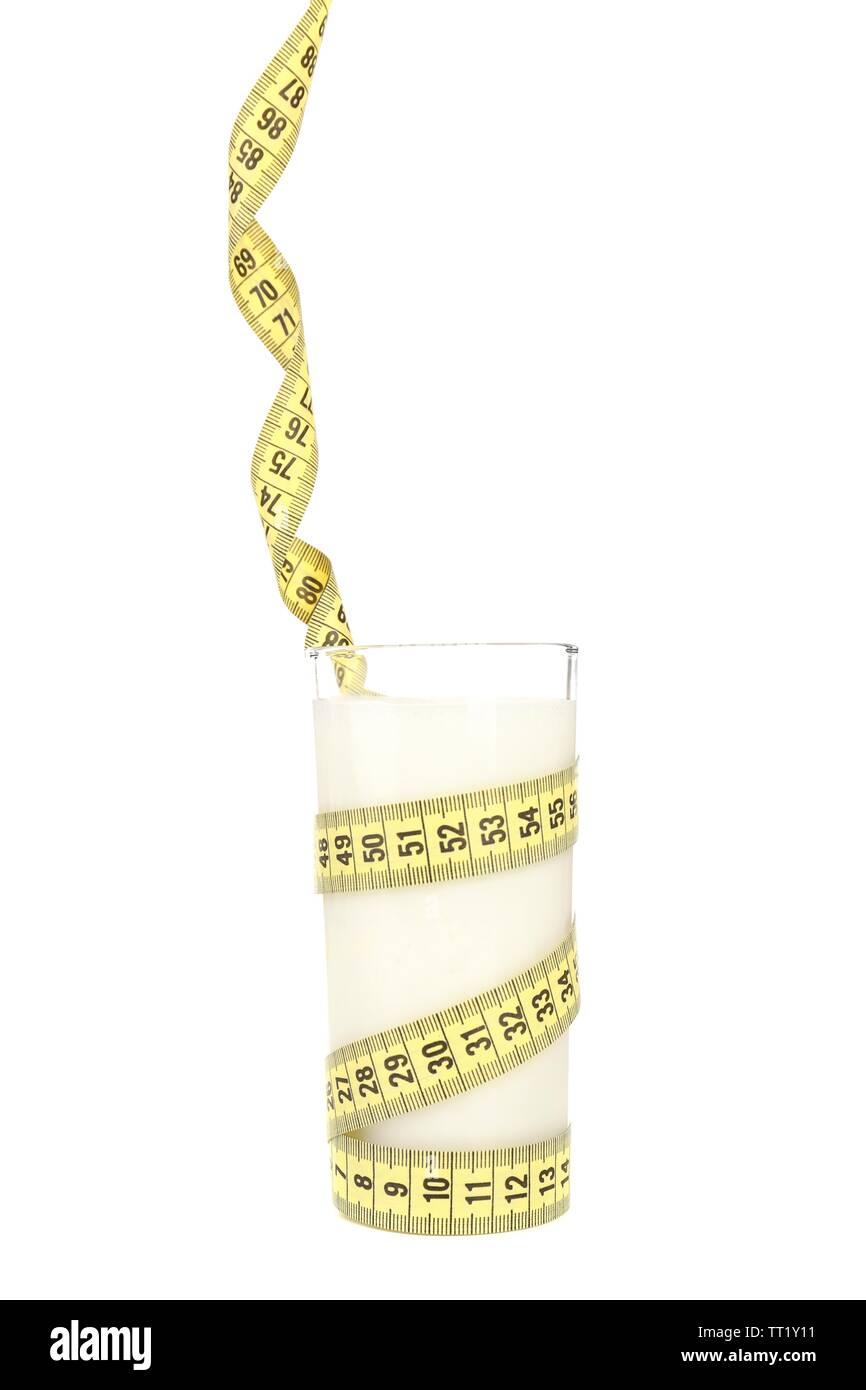 Glass of milk with measuring tape isolated on white Stock Photo - Alamy