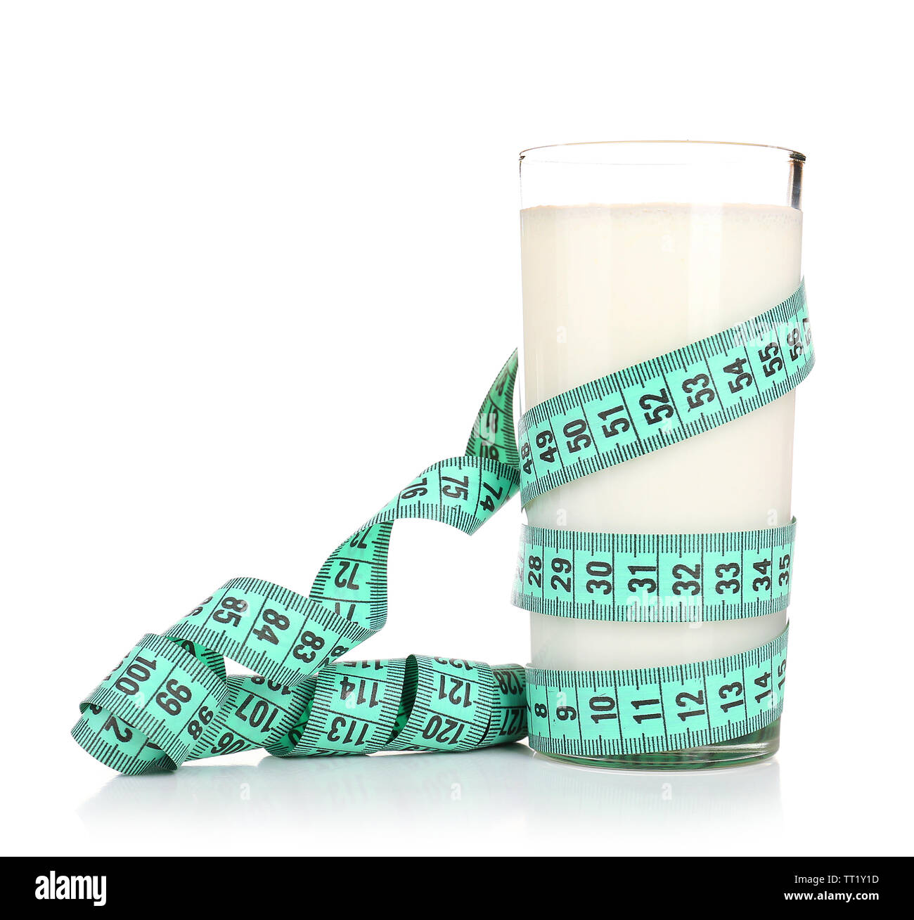 Glass of milk with measuring tape isolated on white Stock Photo - Alamy