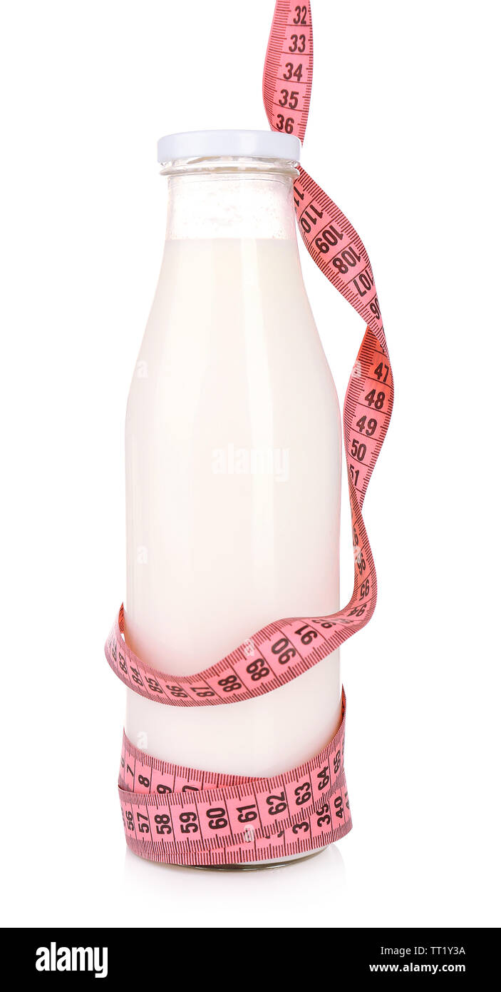 Bottle of milk with measuring tape isolated on white Stock Photo - Alamy