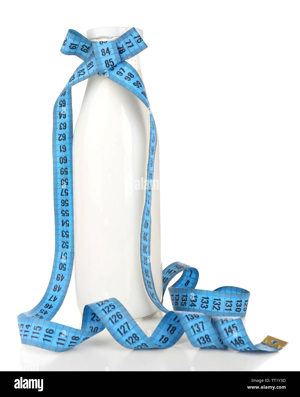 Bottle of milk with measuring tape isolated on white Stock Photo - Alamy