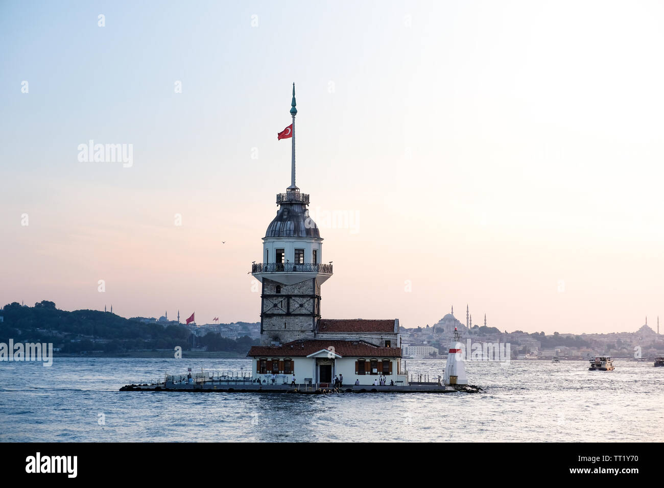 Sunset at Maiden's Tower in Istanbul, Turkey. This tower known as "Kiz ...