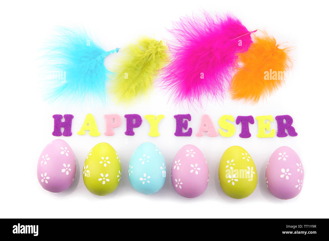 Easter eggs and decorative feathers isolated on white Stock Photo - Alamy