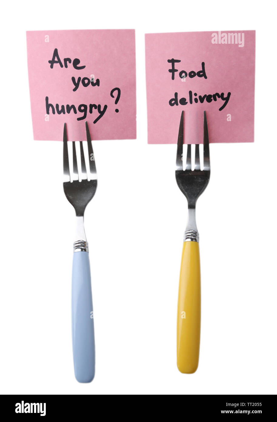 Note papers with messages attached to forks, isolated on white Stock ...