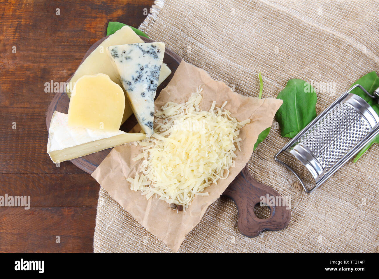 Different Italian cheese on sackcloth, on wooden background Stock Photo ...