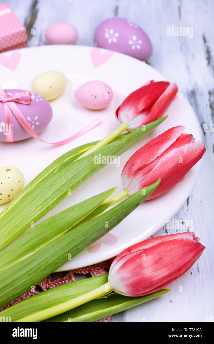 Easter table setting with tulips and eggs Stock Photo - Alamy