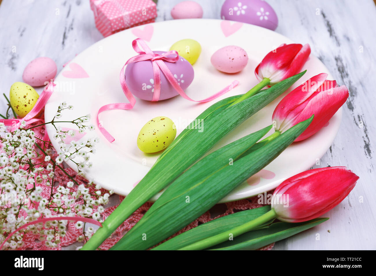 Easter table setting with tulips and eggs Stock Photo - Alamy