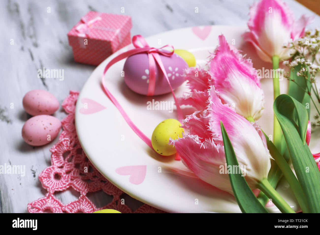 Easter table setting with tulips and eggs Stock Photo - Alamy
