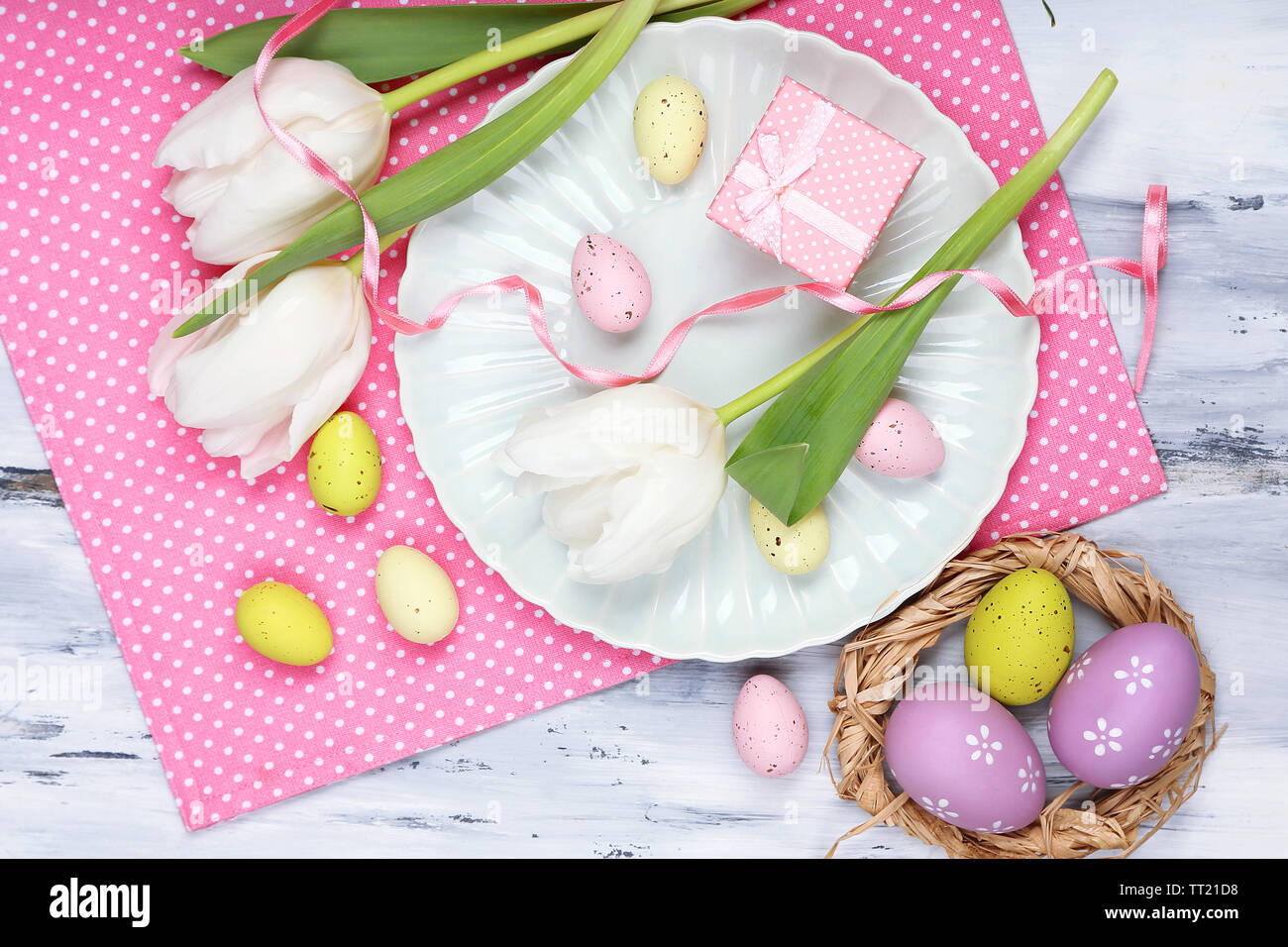 Easter table setting with tulips and eggs Stock Photo - Alamy