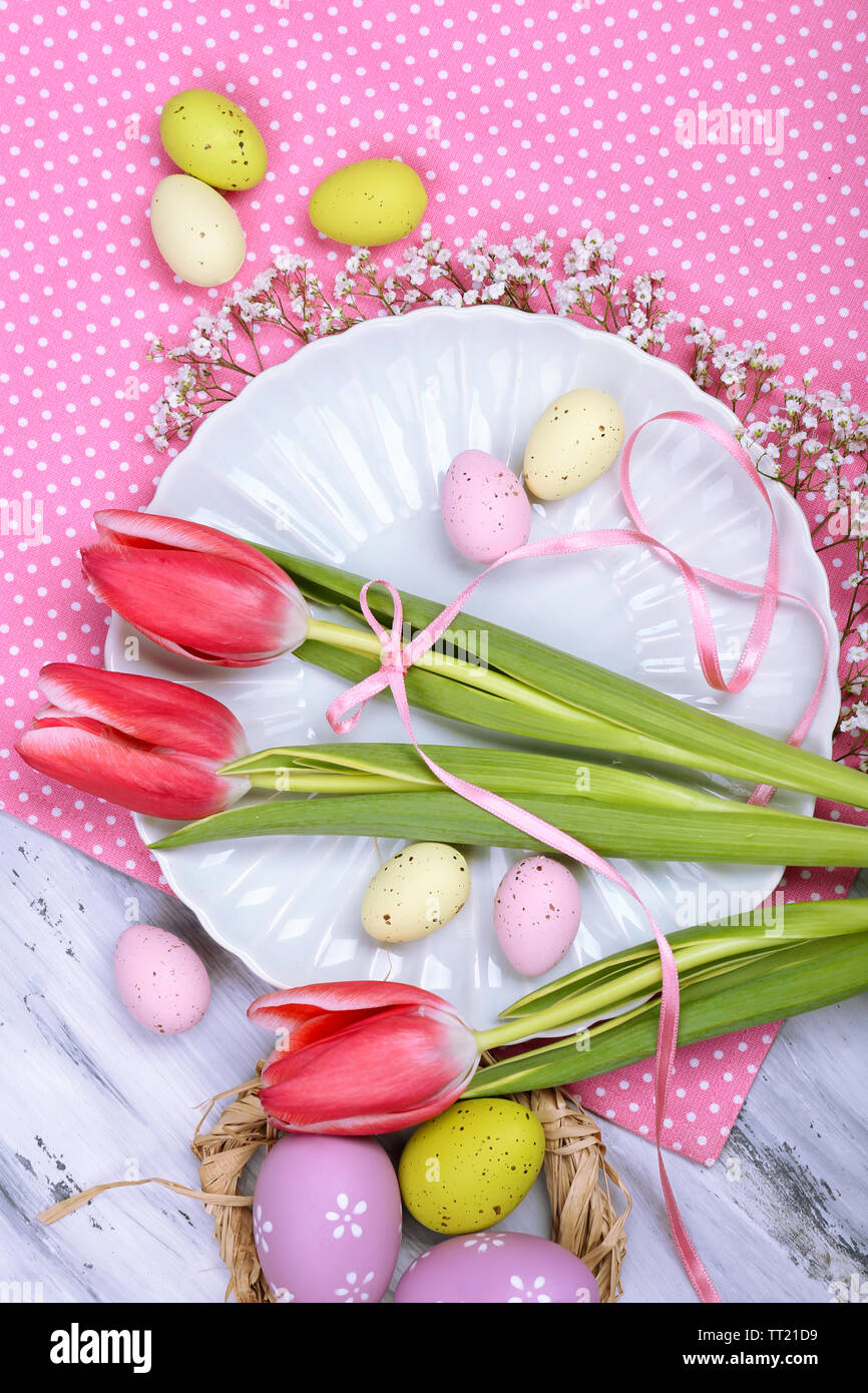 Easter table setting with tulips and eggs Stock Photo - Alamy