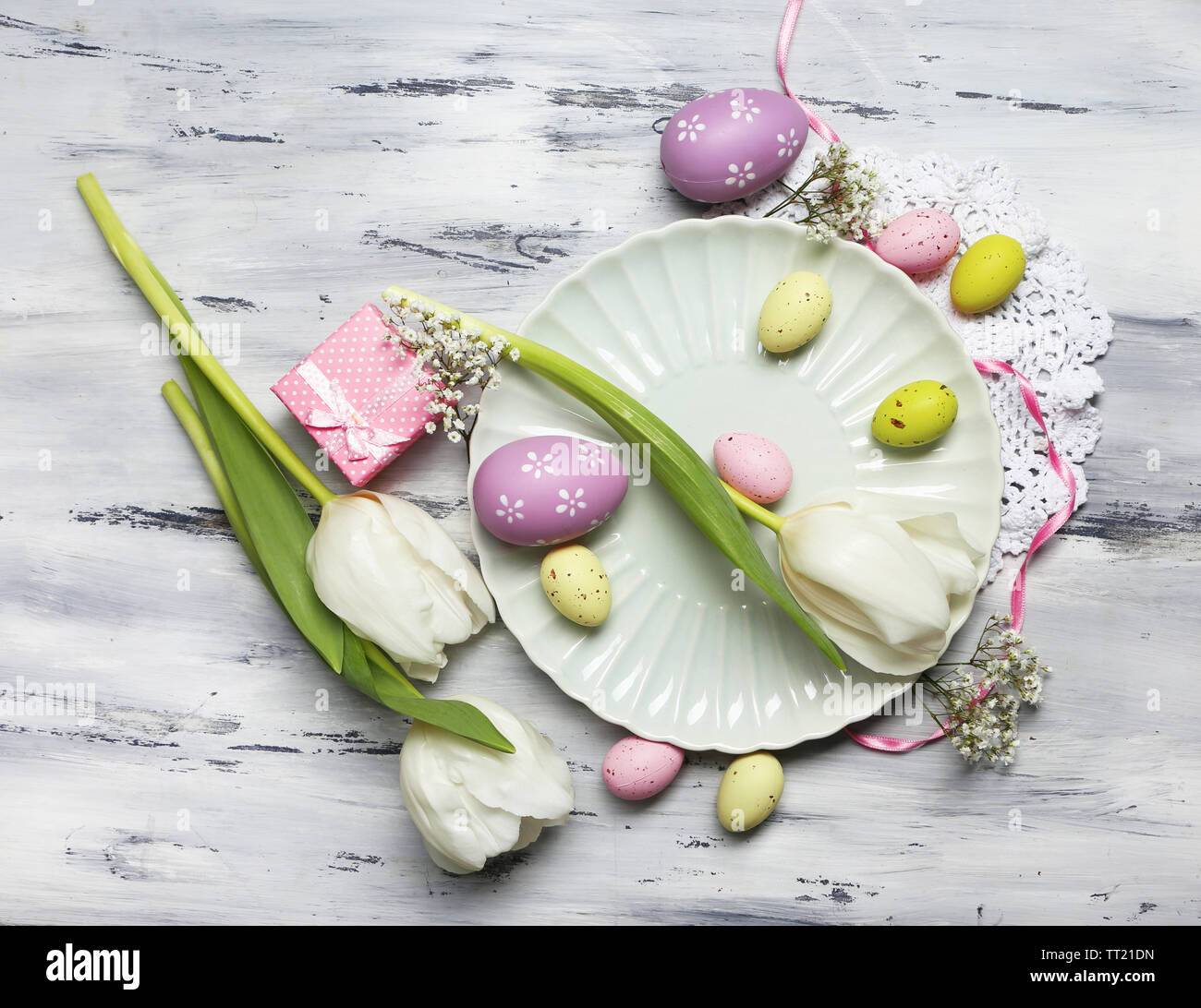Easter table setting with tulips and eggs Stock Photo - Alamy
