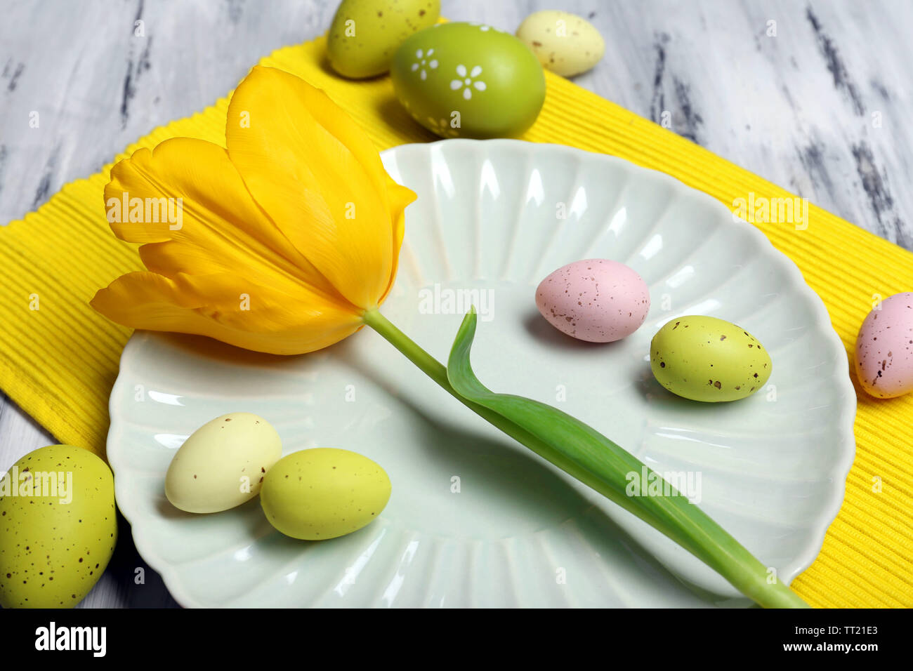 Easter table setting with tulips and eggs Stock Photo - Alamy